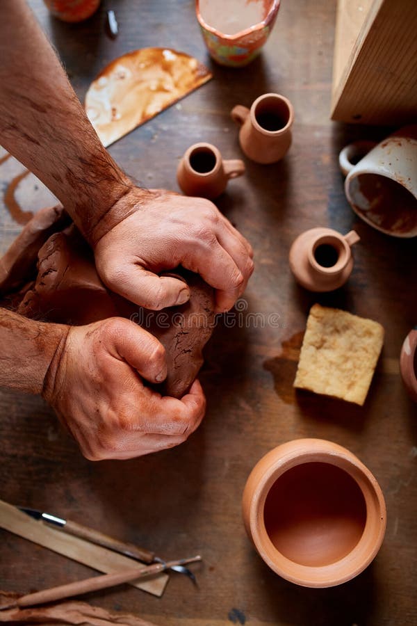 Male Potter Molding a Clay in Pottery Workshop, Close-up, Selective ...