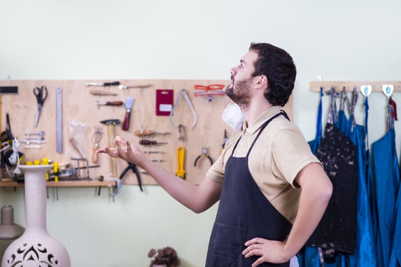Male Potter in Workshop Posing Against Instruments Panel Stock Photo ...