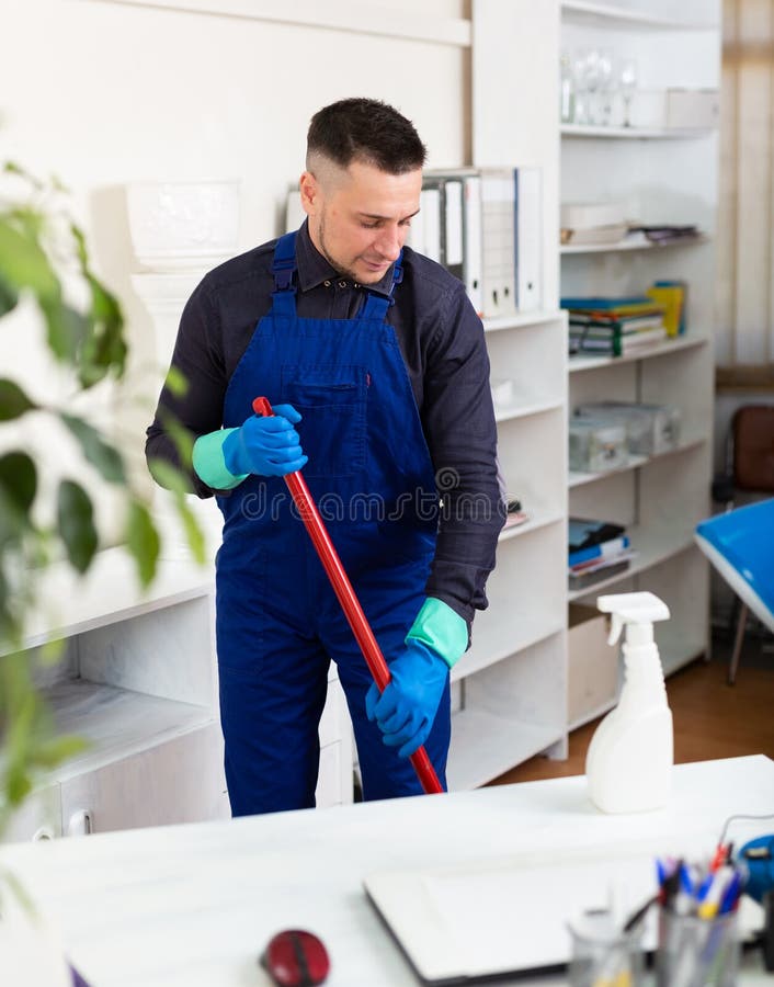 503 Man Dusting Desk Stock Photos - Free & Royalty-Free Stock Photos ...