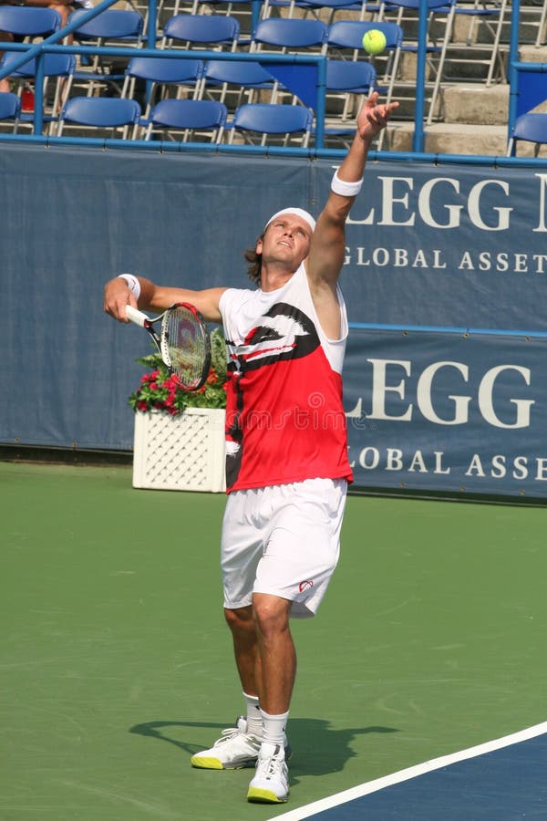 Male Professional Tennis Player Serve Editorial Photo - Image of ...