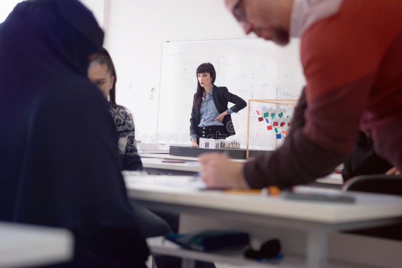 Male Professor of Architecture Explain Lesson To Multiethnic Students ...