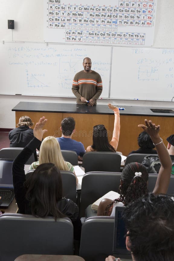 Male Professor Communicating with Students Stock Image - Image of ...