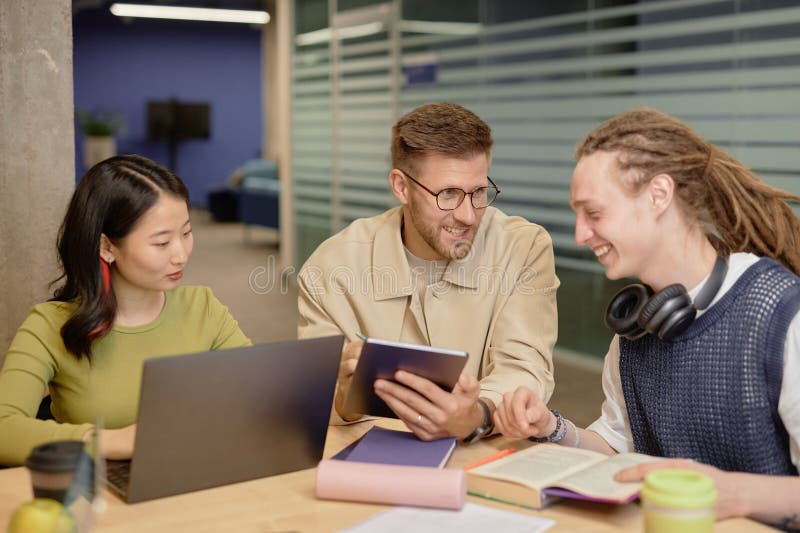 Male Professor and Students Socially Interact during Class Stock Photo ...