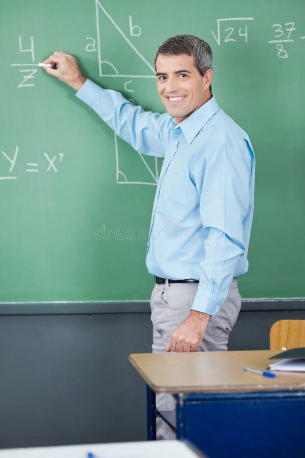 Male Professor Writing Formula on Board Stock Photo - Image of math ...