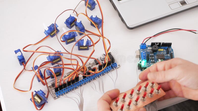 Male Programmer Creates Robotics An Arduino Board Controls Servo 7667