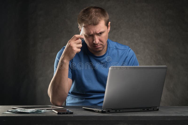 Male Programmer Solves a Problem Near a Computer Stock Photo - Image of ...
