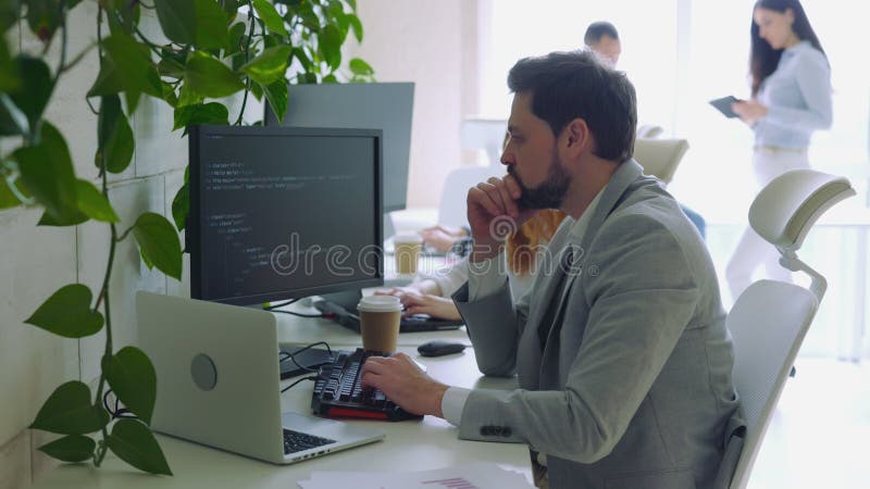 Male it Programmer Working on Desktop Computer. Guy Writing Code in ... Male it Programmer Working on Desktop Computer. Guy Writing Code in ...