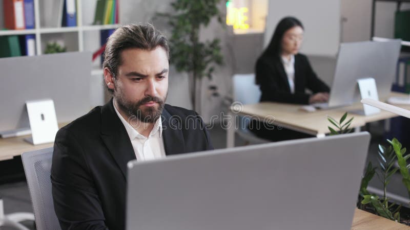 Male Programmer Using Computer In Software Company Office Stock Video