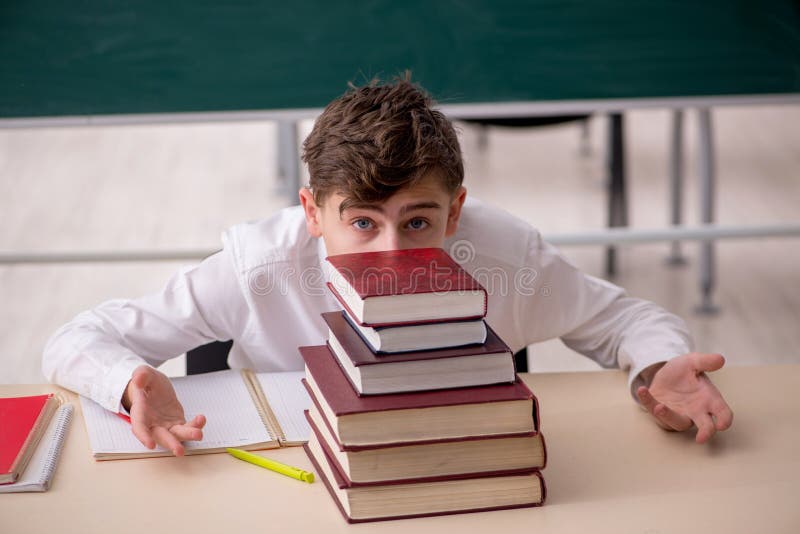 Boy Sitting in the Classrom Stock Photo - Image of learning, lesson ...