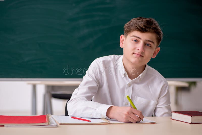 Boy Sitting in the Classrom Stock Image - Image of learning, college ...