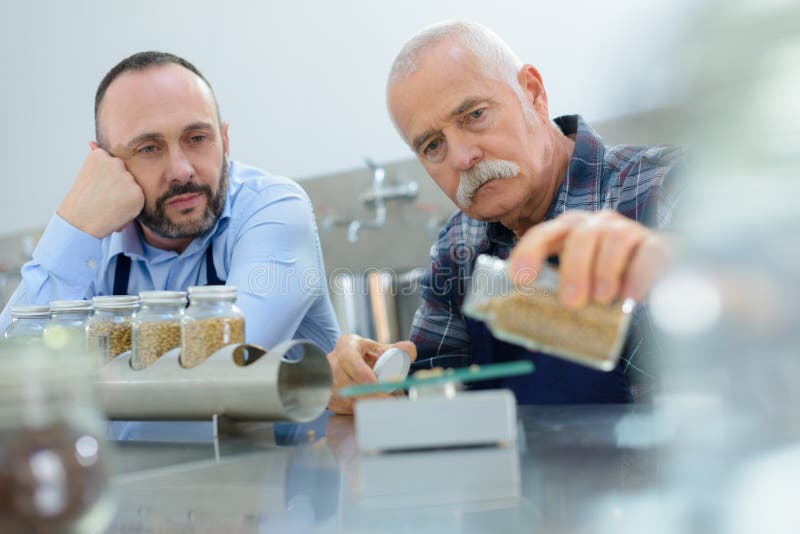 Male Quality Control Workers Weighing Ingredients Stock Image - Image ...