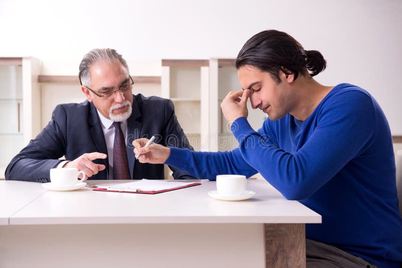 Male Real Estate Agent and Male Client in the Apartment Stock Image ...