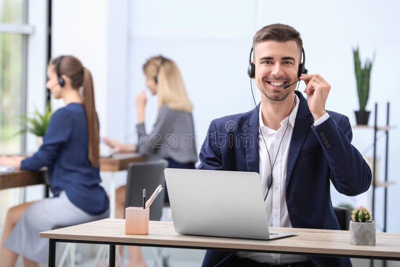 Male Receptionist with Headset at Desk Stock Image - Image of company ...