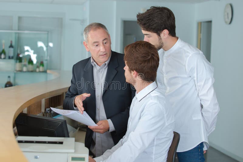 Male Receptionist on Training Stock Photo - Image of apprentice ...