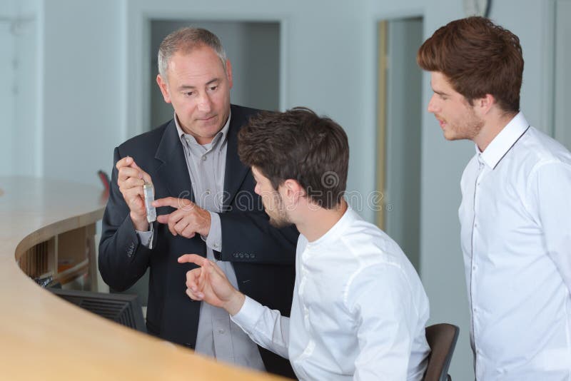 Male Receptionist Training Students Stock Photo - Image of elegant ...