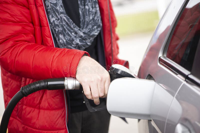 Male Refilling the Car with Fuel at the Refuel Station Stock Photo ...