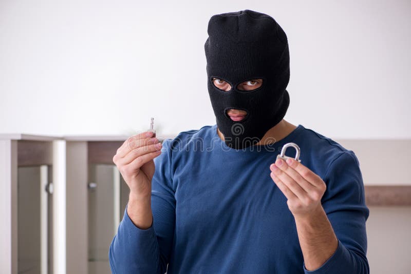 Male Robber Stealing Valuable Things from the House Stock Image - Image ...