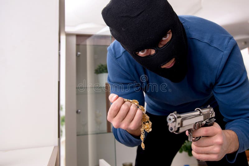 Male Robber Stealing Valuable Things from the House Stock Image - Image ...