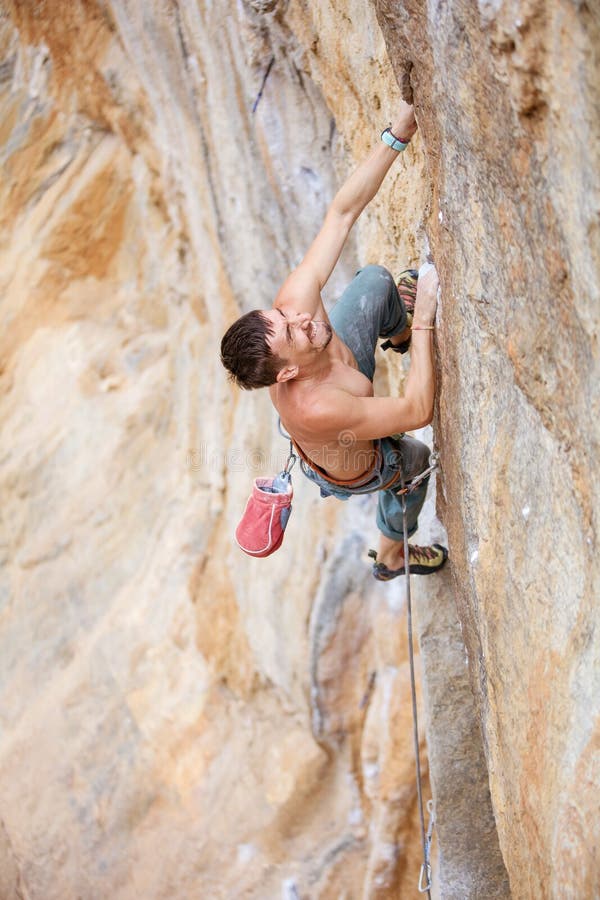 Male rock climber on cliff stock image. Image of extreme - 79335287