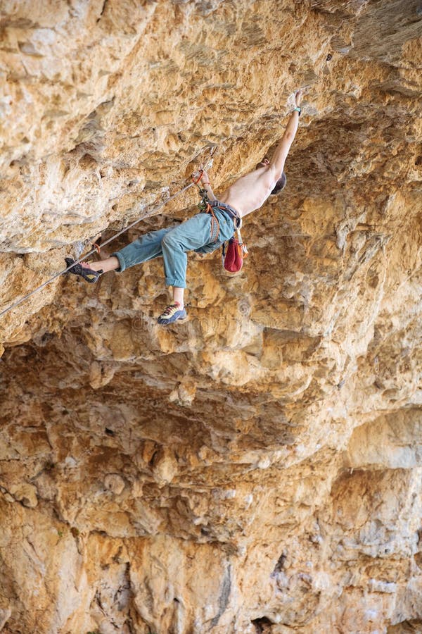 Male rock climber on cliff stock image. Image of extreme - 79337591