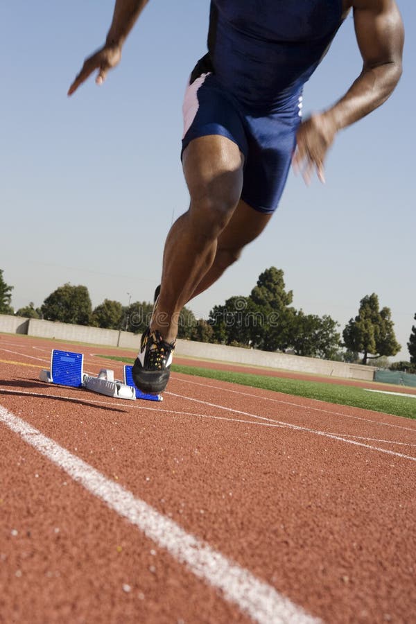 Male Runner in the Start Up Position Stock Image - Image of block ...