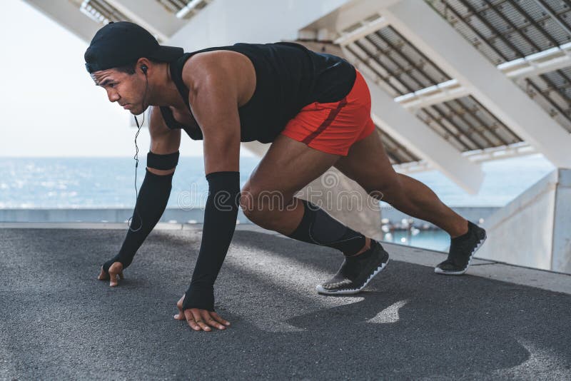 Male Runner Doing Stretching Exercise, Preparing for Morning Workout ...