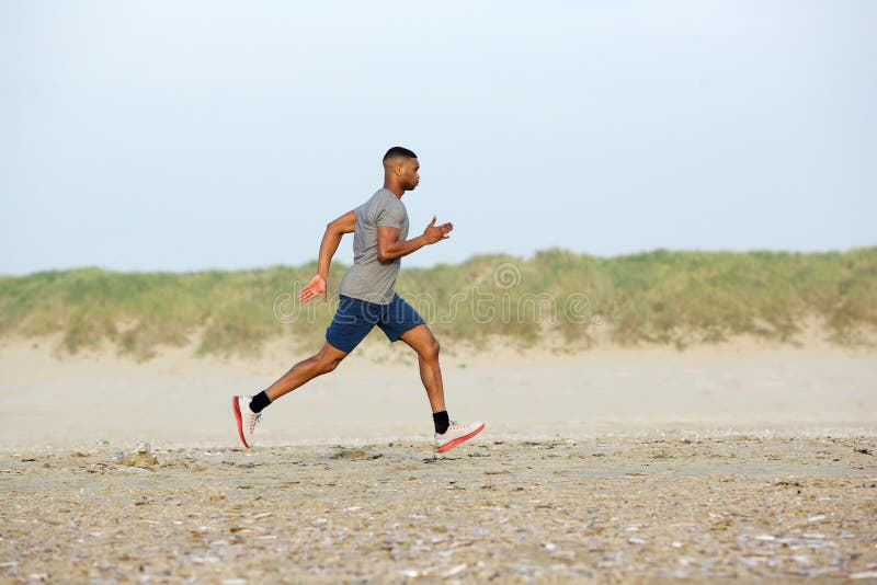 Male Runner Exercising on the Beach Stock Photo - Image of care ...