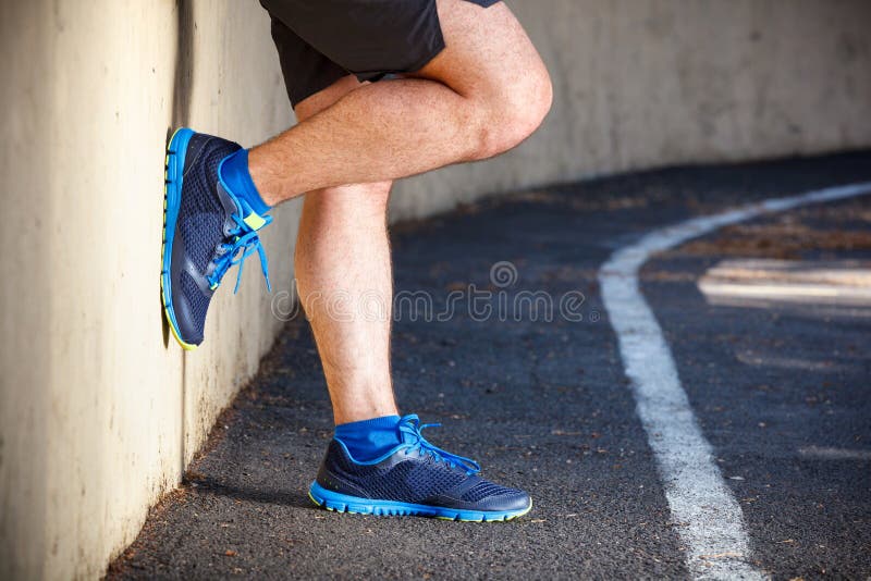 Male Runner Leaning Relaxed Stock Photo - Image of crop, body: 41171716