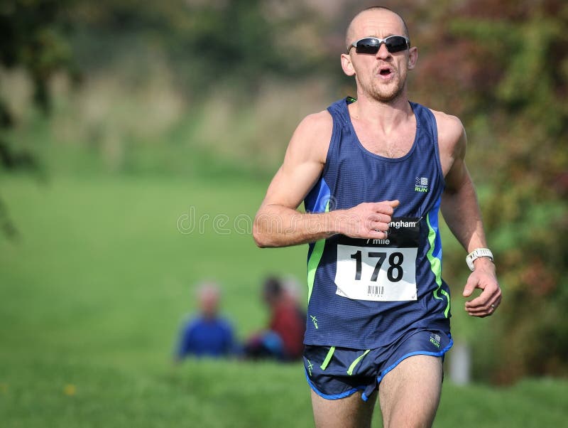 Runner Near the Finish Line Editorial Photography - Image of athletic ...