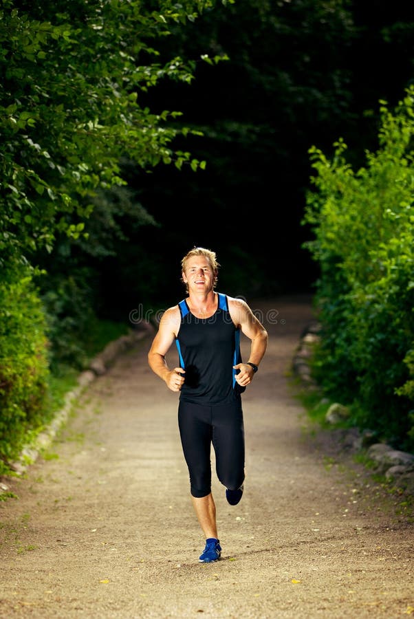 Male Runner in Park stock image. Image of road, running - 26692567