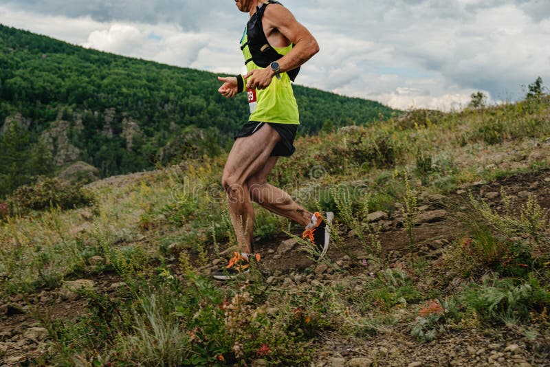 Male Runner Running Down Mountain Editorial Image - Image of marathon ...