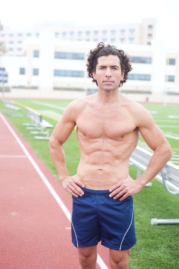 Male runner in stadium stock image. Image of runner, muscle - 24562855