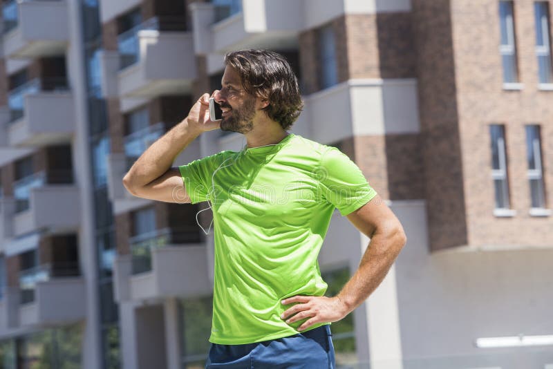 Male Runner Using Mobile Phone Outdoor Stock Image - Image of fitness ...