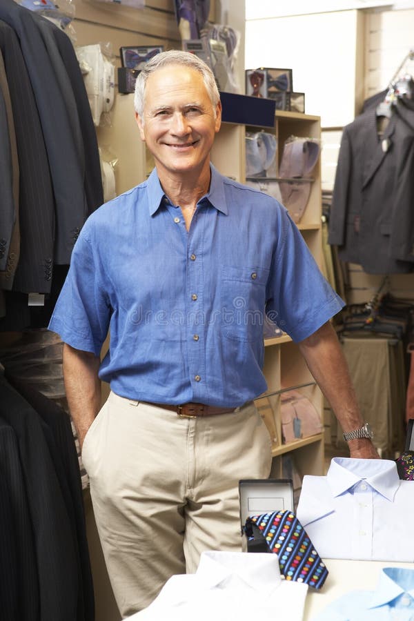 Sales Assistant with Customer in Clothing Store Stock Photo - Image of ...