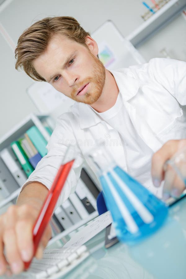 Male Scientist Doing Research Stock Photo - Image of laboratory ...