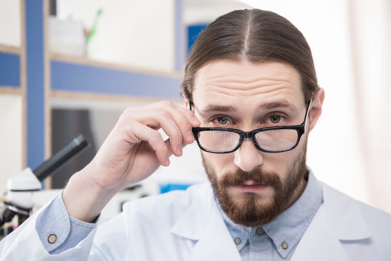 Male Scientist in Eyeglasses Stock Image - Image of scientist, view ...