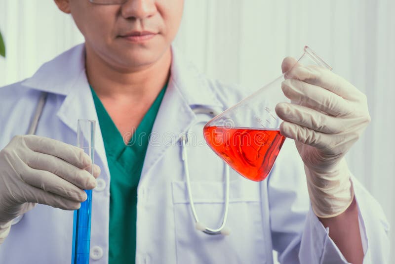 Male Scientist Holds and Examine Samples Stock Photo - Image of ...