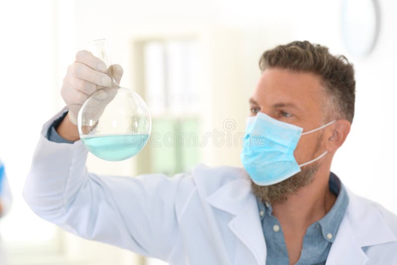 Male Scientist with Protective Mask Working in Laboratory Stock Image ...