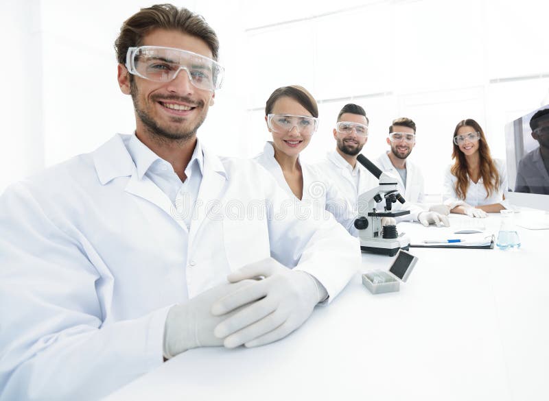 Male Scientist and the Team in the Lab. Stock Image - Image of person ...