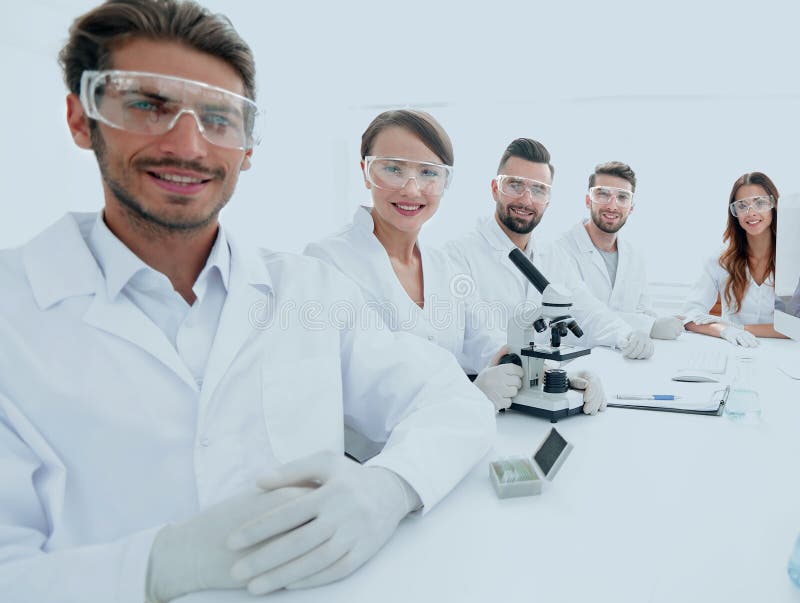 Male Scientist and the Team in the Lab. Stock Image - Image of person ...