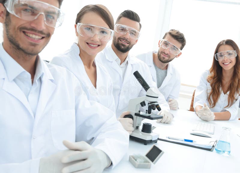 Male Scientist and the Team in the Lab. Stock Photo - Image of ...