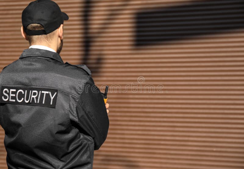 Male Security Guard Outdoors, Back View Stock Photo - Image of sentry ...