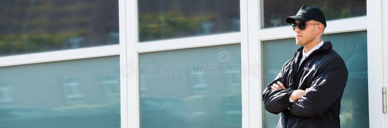 Male Security Guard Standing Arms Crossed on Street Stock Photo - Image ...