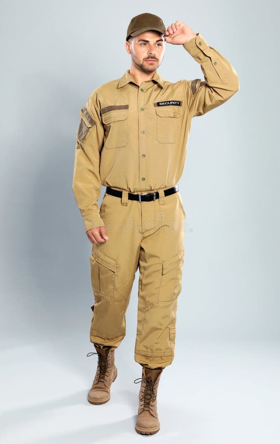 Male Security Guard in Uniform on Grey Stock Image - Image of service ...