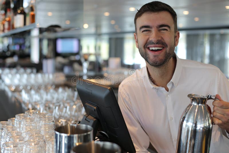 Male Server Smiling Behind the Counter Stock Image - Image of cafe ...