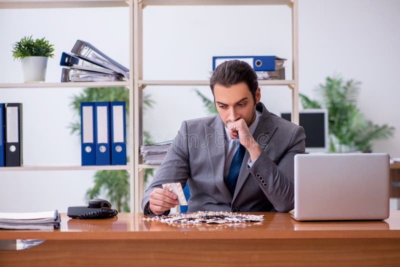 Young Male Sick Employee Suffering at Workplace Stock Image - Image of ...