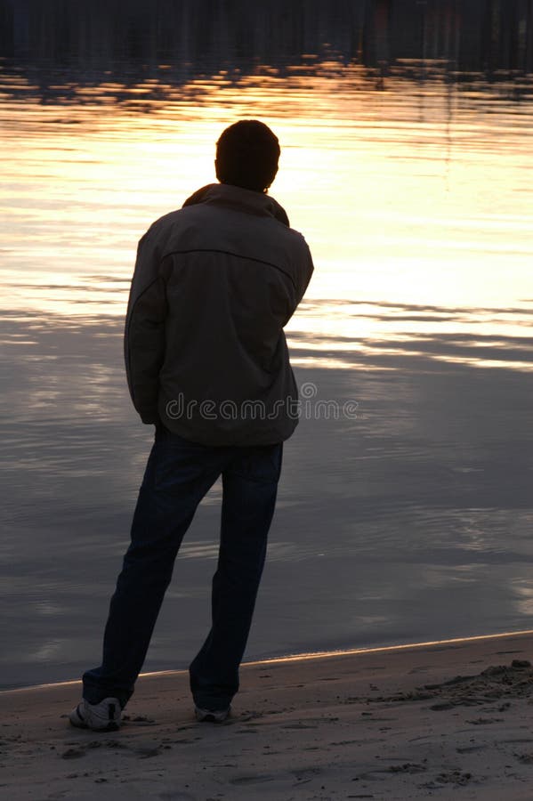 Male Silhouette at Sunset stock image. Image of gaze, look - 759211