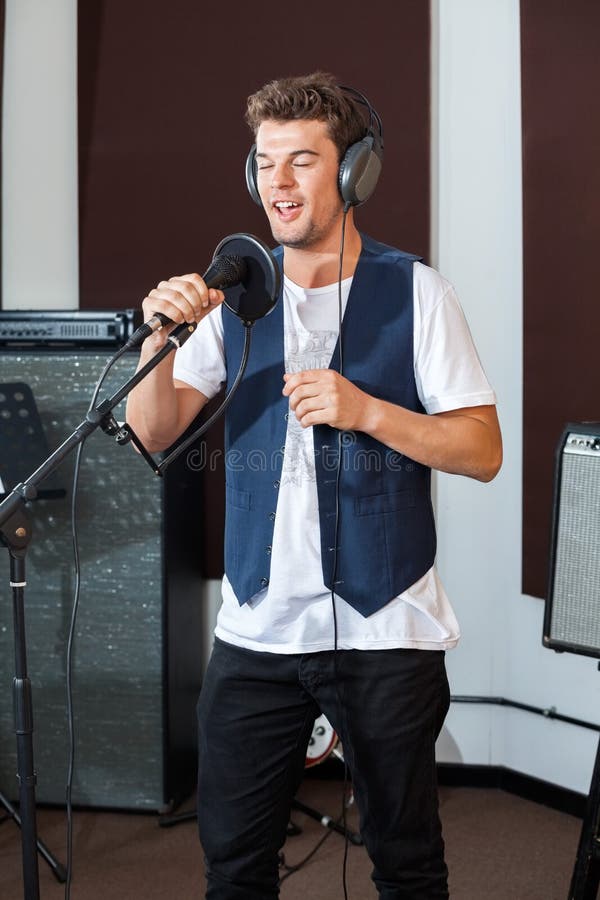 Male Singer Performing in Recording Studio Stock Photo - Image of ...
