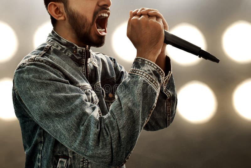 Male Singer Smiling with Microphone Stock Image - Image of performance ...