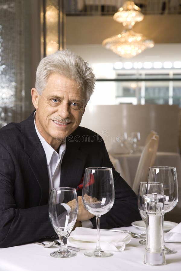 Male sitting at restaurant stock image. Image of place - 2045047